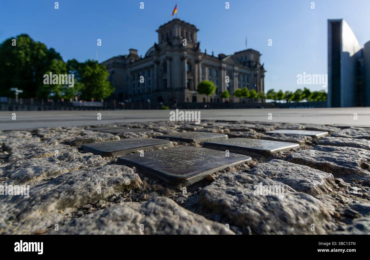 Stolpersteine memorial stones in Berlin commemorate Nazi victims, with ...
