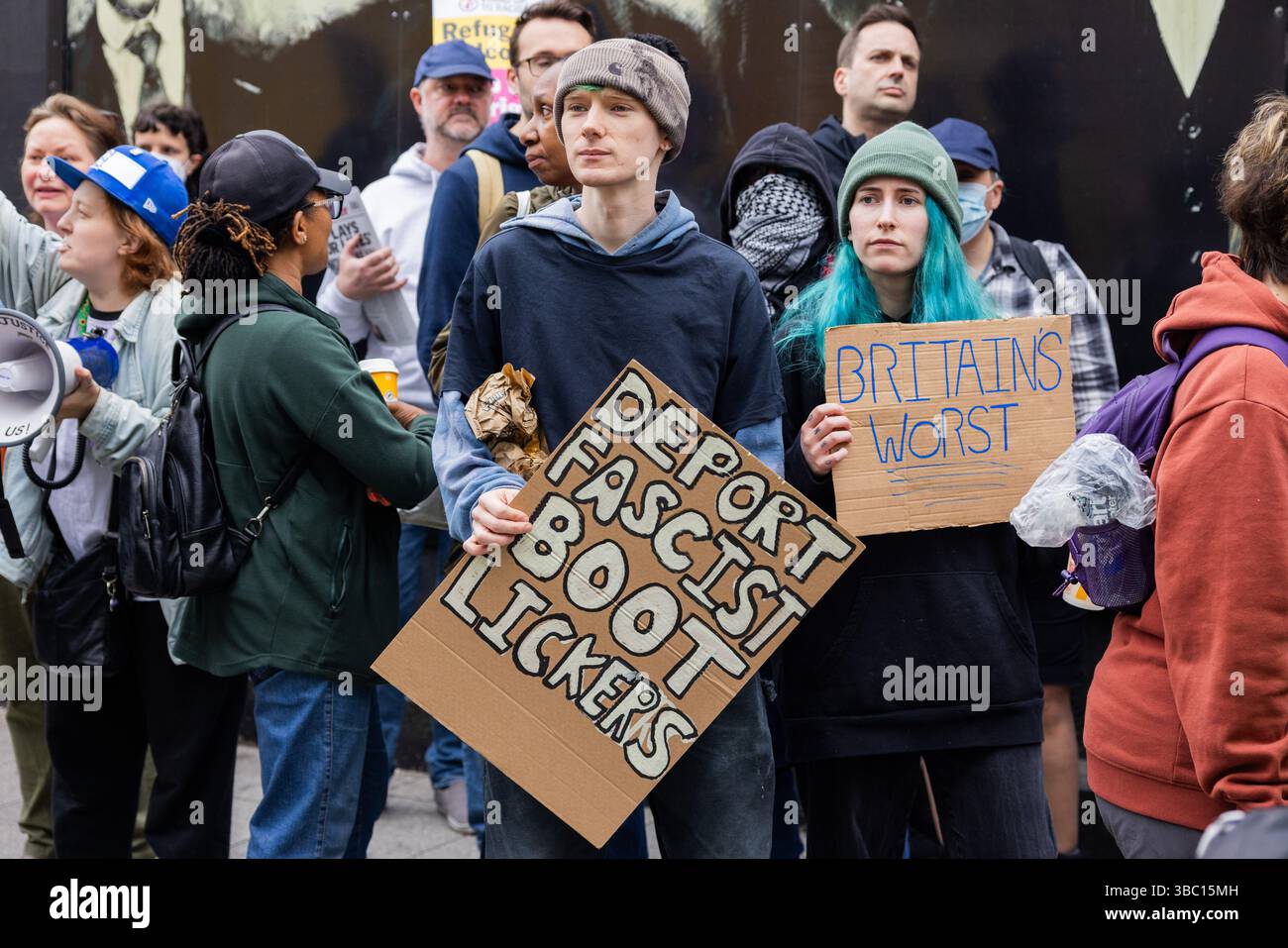 Birmingham, UK. 17 MAY, 2025. Counter Protestors hold "Deport Fascist ...