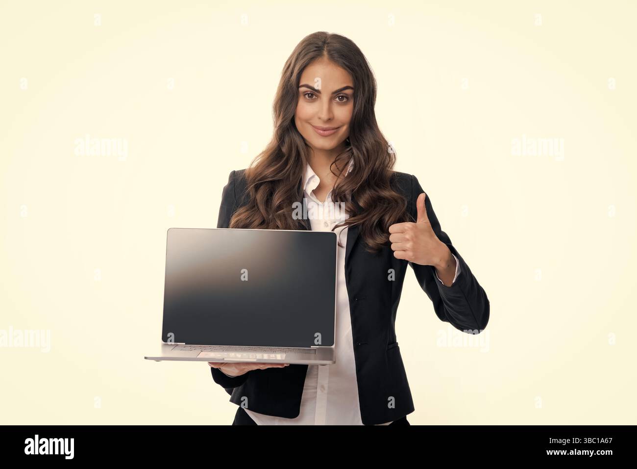 Portrait of positive cheerful ceo expert business woman work at laptop ...