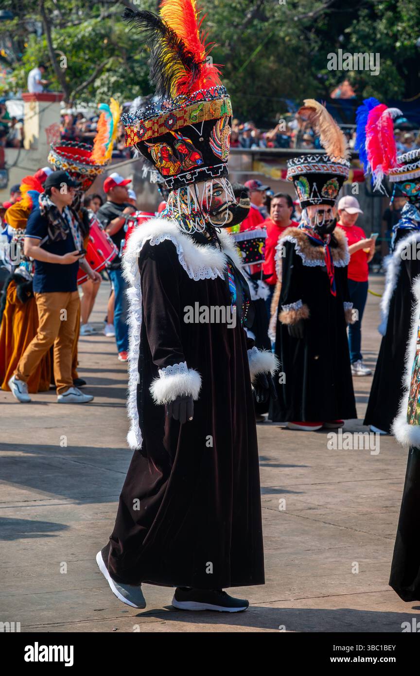 TEPOZTLAN, MORELOS, MEXICO -- March 2025: The chinelos of Tepoztlan ...