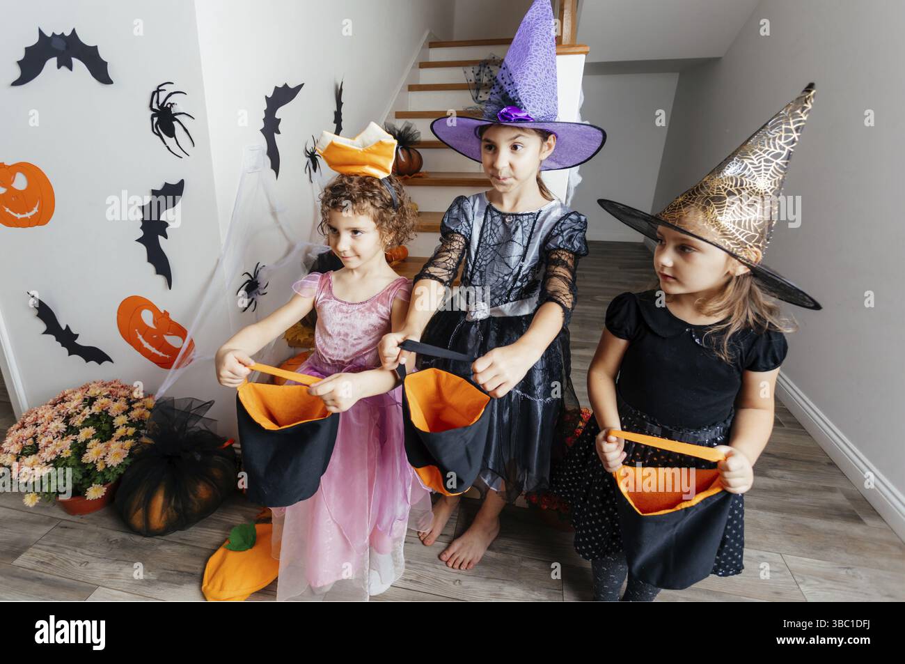 Closeup unrecognisable hands holding bunch of candies, three cheerful ...