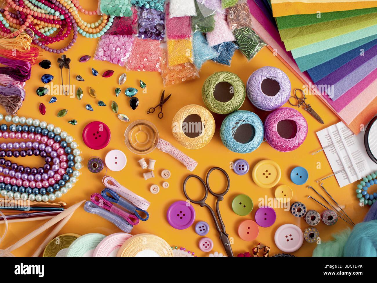 Craft and hobby materials top view on the orange background. DIY ...