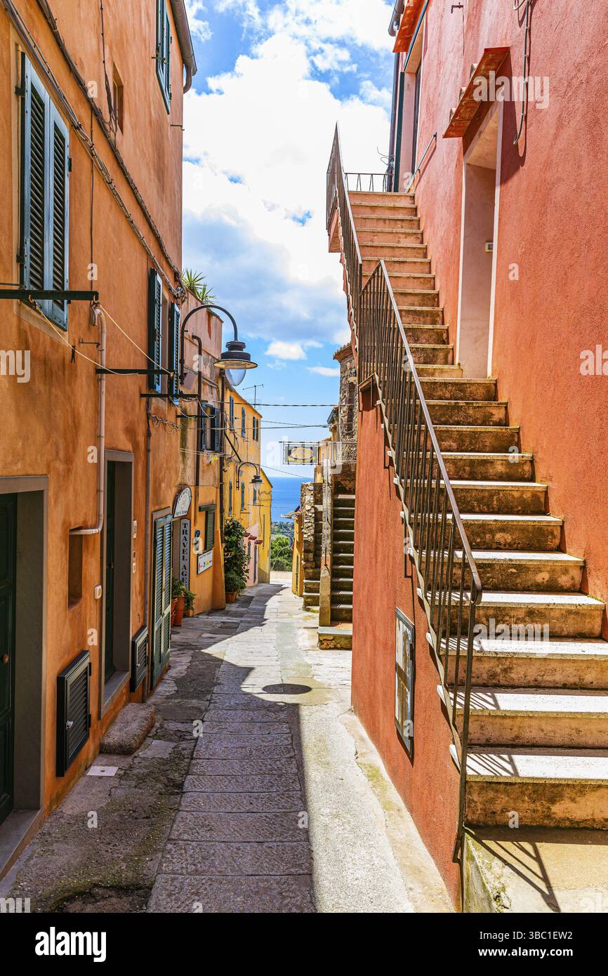 Houses with pastel-coloured facades and steep stone steps, Via Roma ...