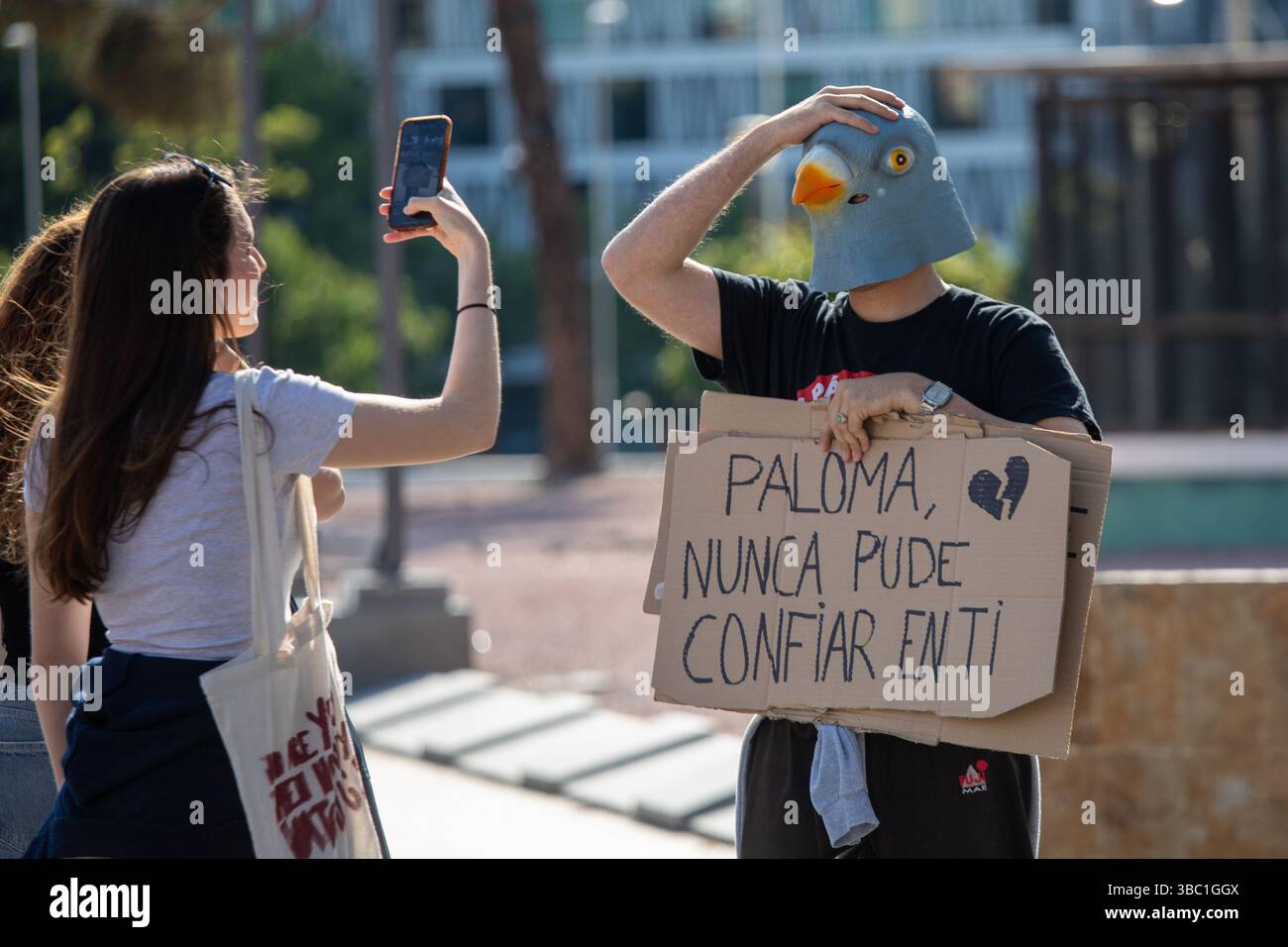 Madrid, Spain. 17th May, 2025. A protester takes photos of a colleague ...