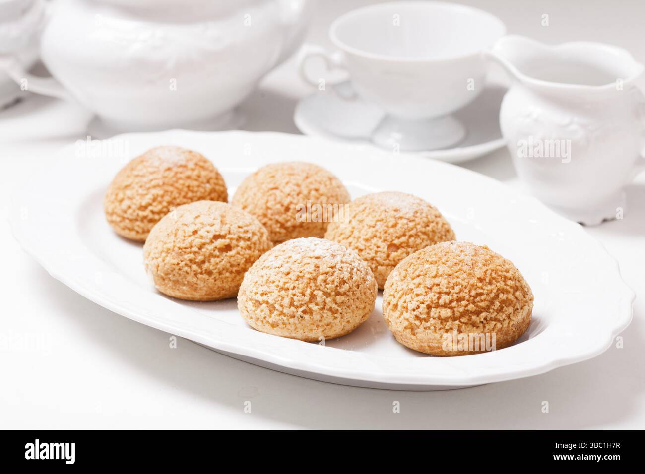 Choux - modern french dessert, puffs with craqueline and vanilla cream ...