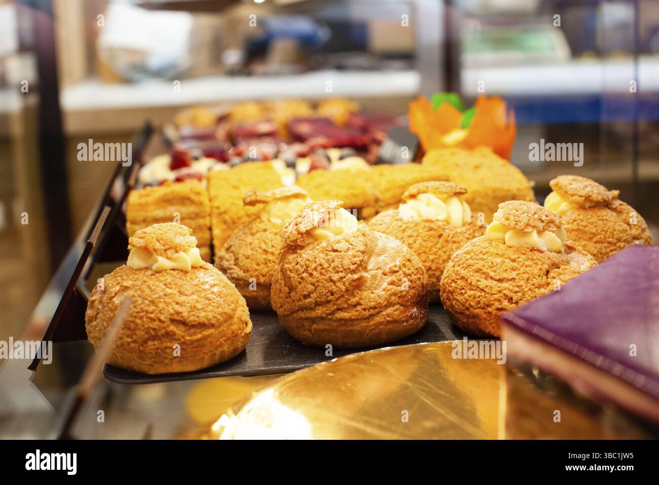 Delicious pastries on display a confectionery shop in europe Stock ...