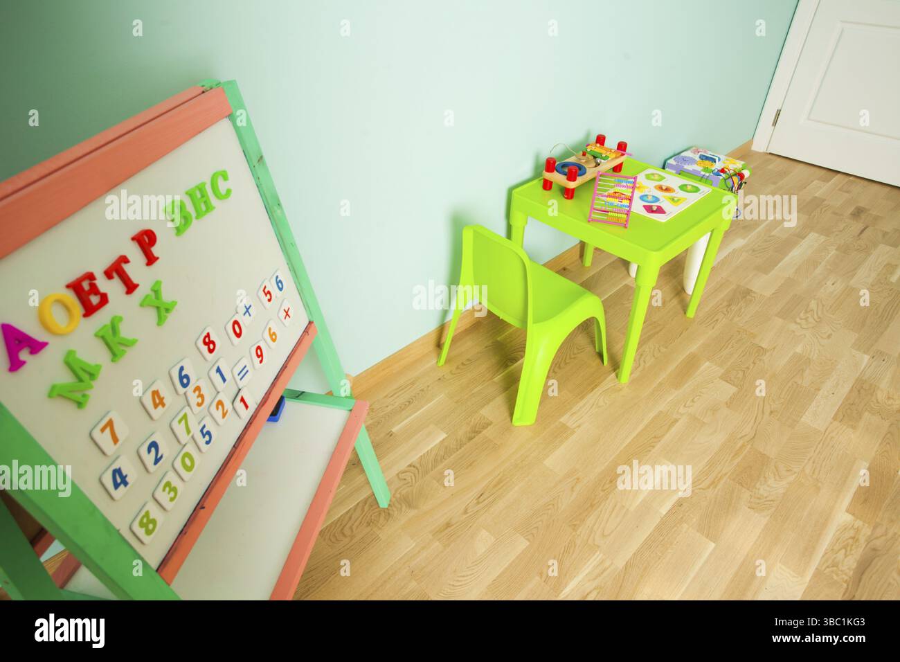 Magnetic board in the modern playroom for children. Learning reading ...