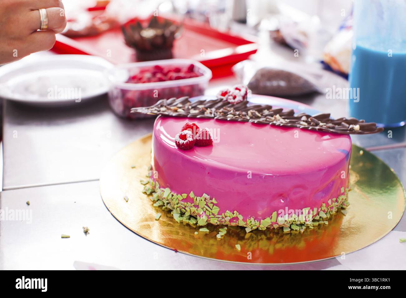 Process of decorating cake with mirror glaze. Modern desserts Stock ...
