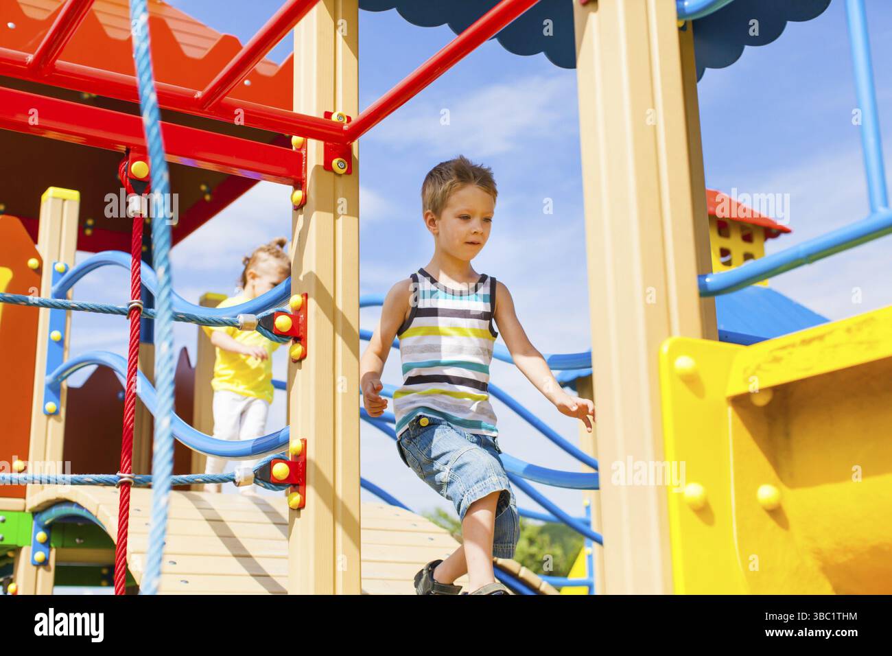 Kids run and play on the colorful playground Stock Photo - Alamy
