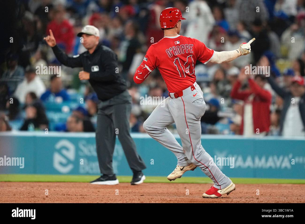 Los Angeles Angels' Logan O'Hoppe gestures toward his dugout after ...