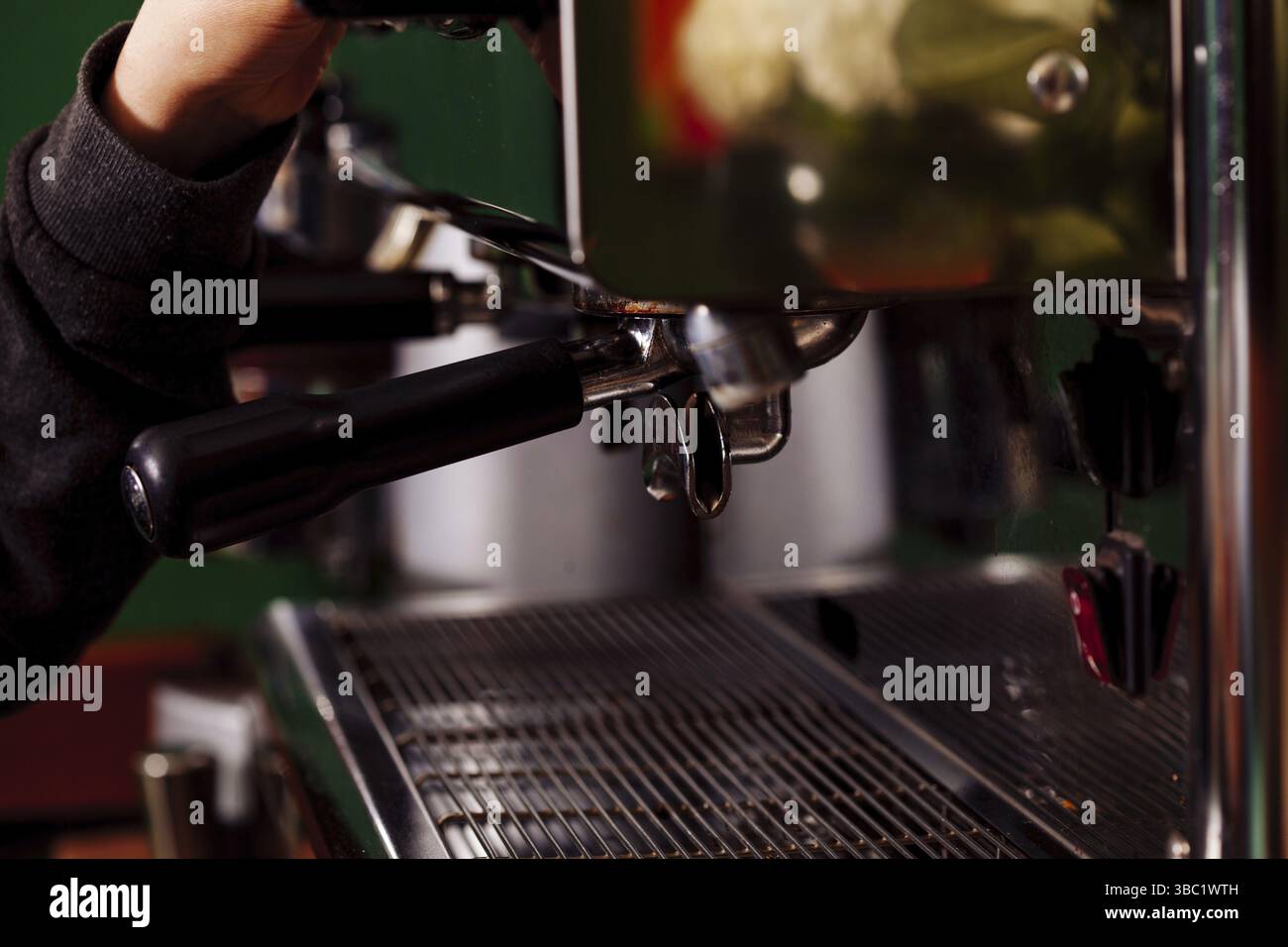 The coffee machine, barista is prepating it to cook coffee. Template ...