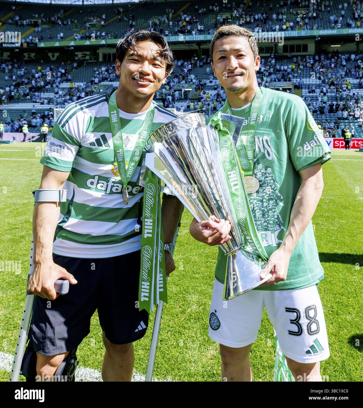 Celtic's Daizen Maeda (R) and teammate Reo Hatate are pictured with the ...