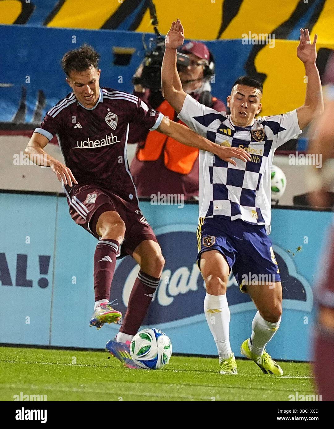Colorado Rapids midfielder Cole Bassett, left, battles for control of ...