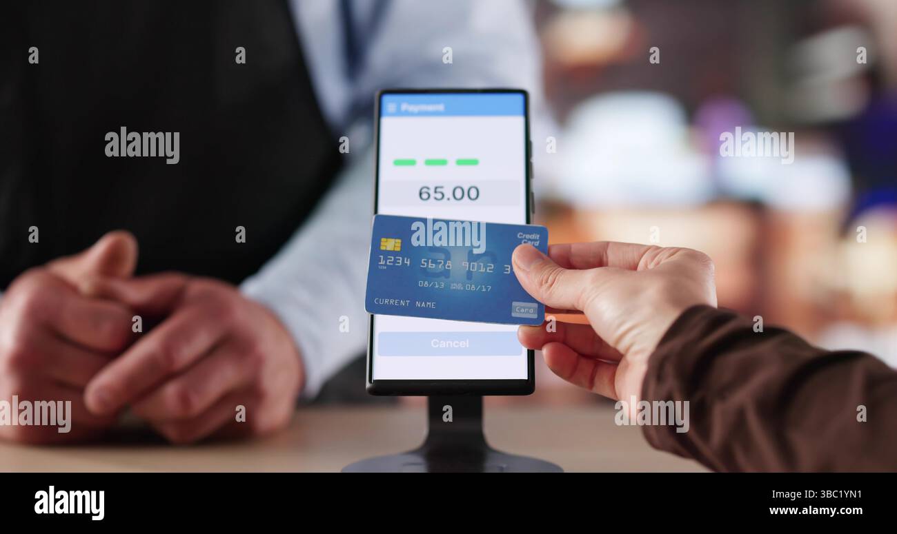 Woman Swiping Credit Card For Contactless Payment At Retail Store Stock ...