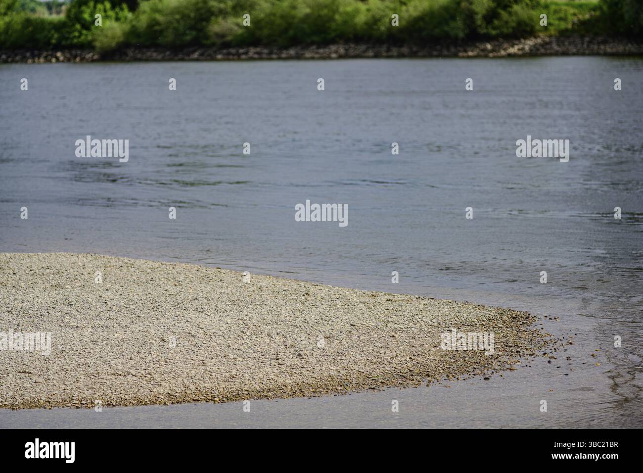 Small pebble bay with calm water on a natural riverbank, Bogen, Lower ...