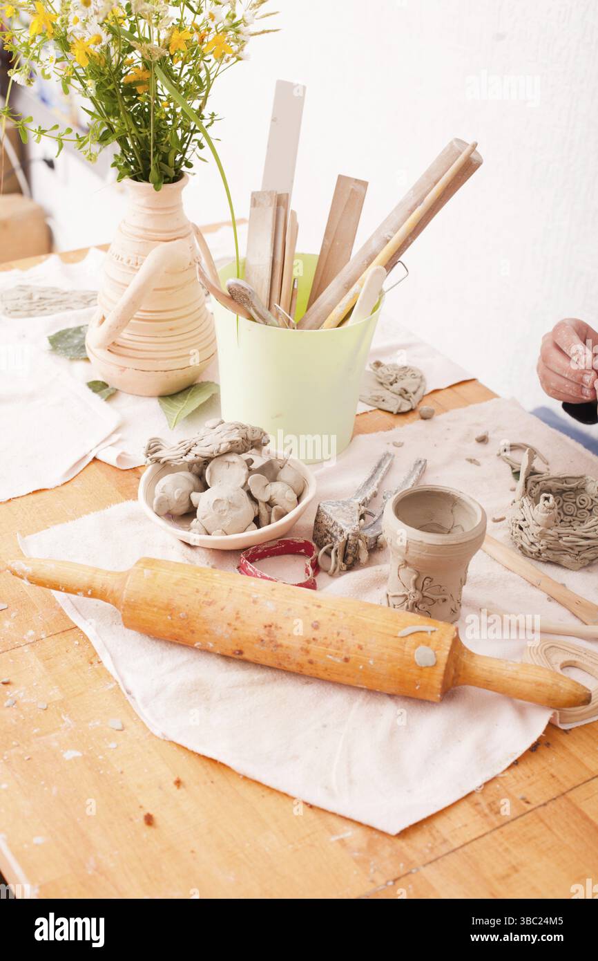 Process modeling figures from modeling clay. Still life Stock Photo - Alamy