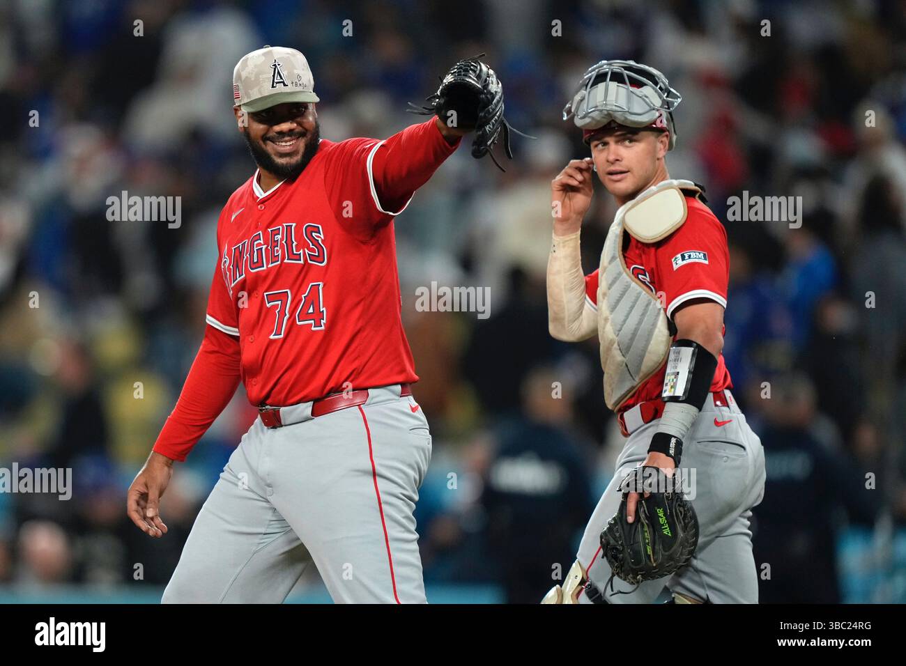 Los Angeles Angels relief pitcher Kenley Jansen, left gestures toward ...