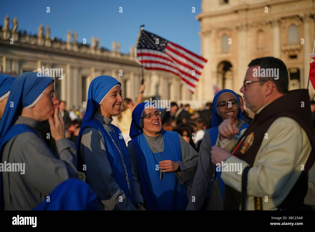 Nuns and a priest talk ahead of Pope Leo XIV's formal inauguration of ...