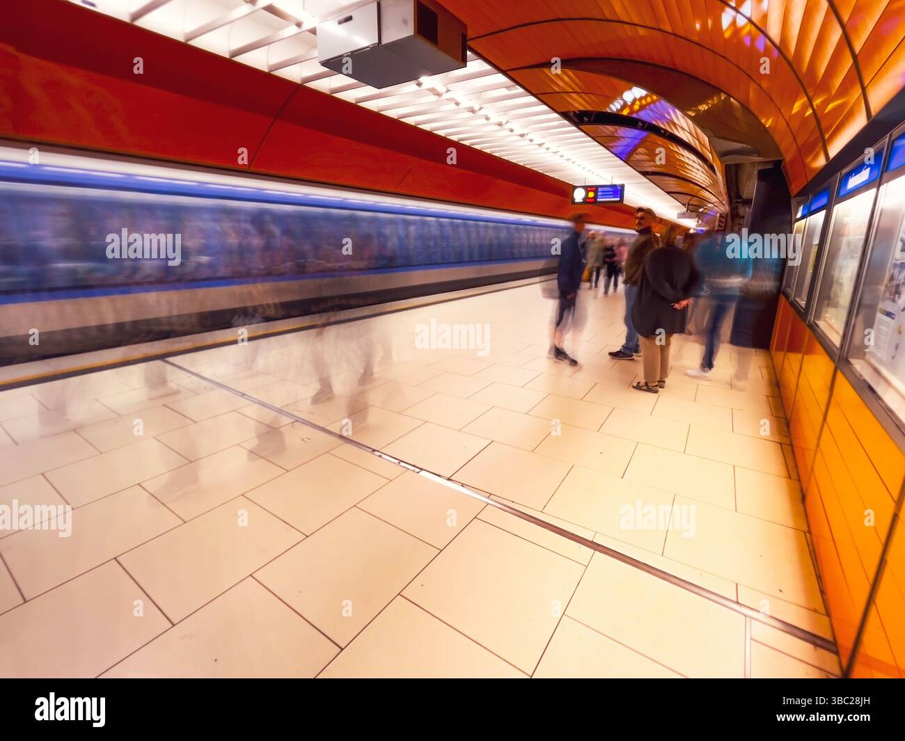 A subway train enters a station in Munich,Germany Stock Photo - Alamy