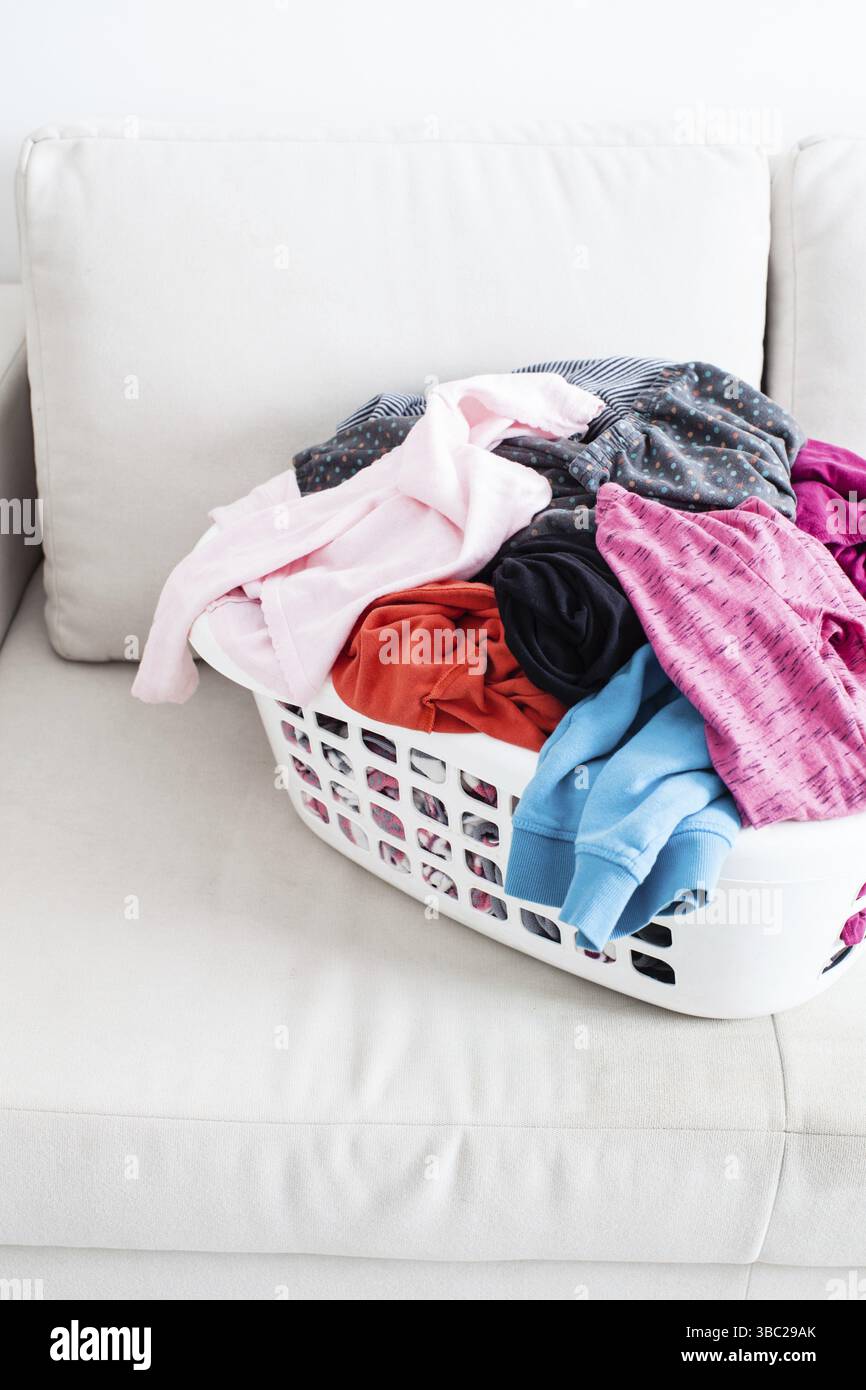 Washed clothes in a basket. Laundry concept Stock Photo - Alamy