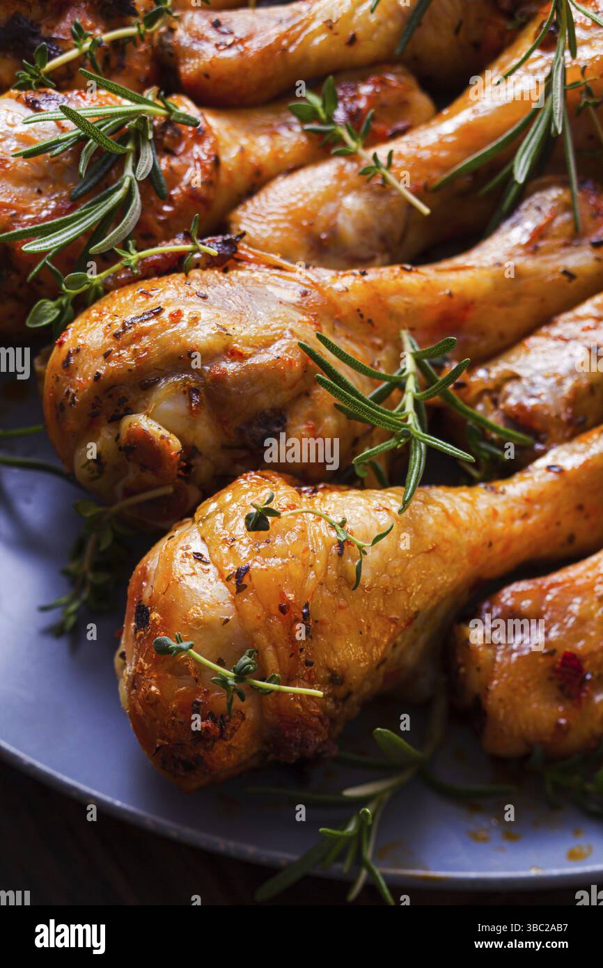 Freshly roasted chicken legs hi-res stock photography and images - Alamy