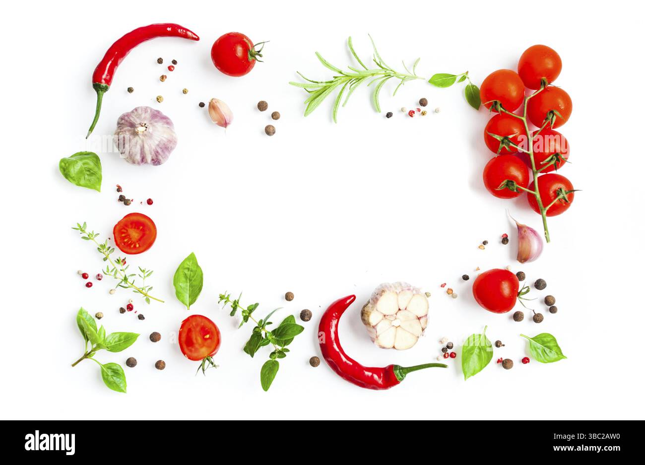 Italian herbs and spices as a frame with copy space on white background ...