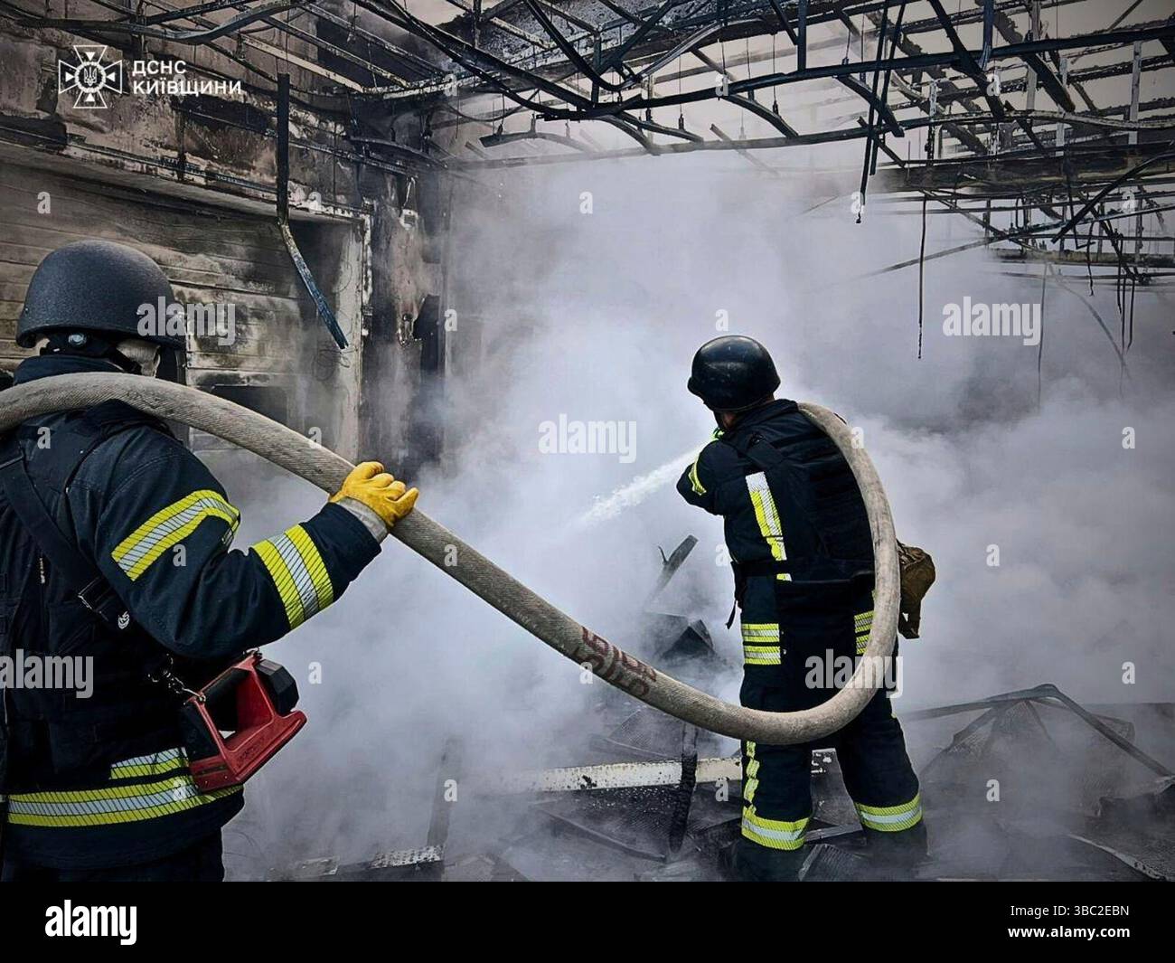 In this photo provided by the Ukrainian Emergency Service, firefighters ...