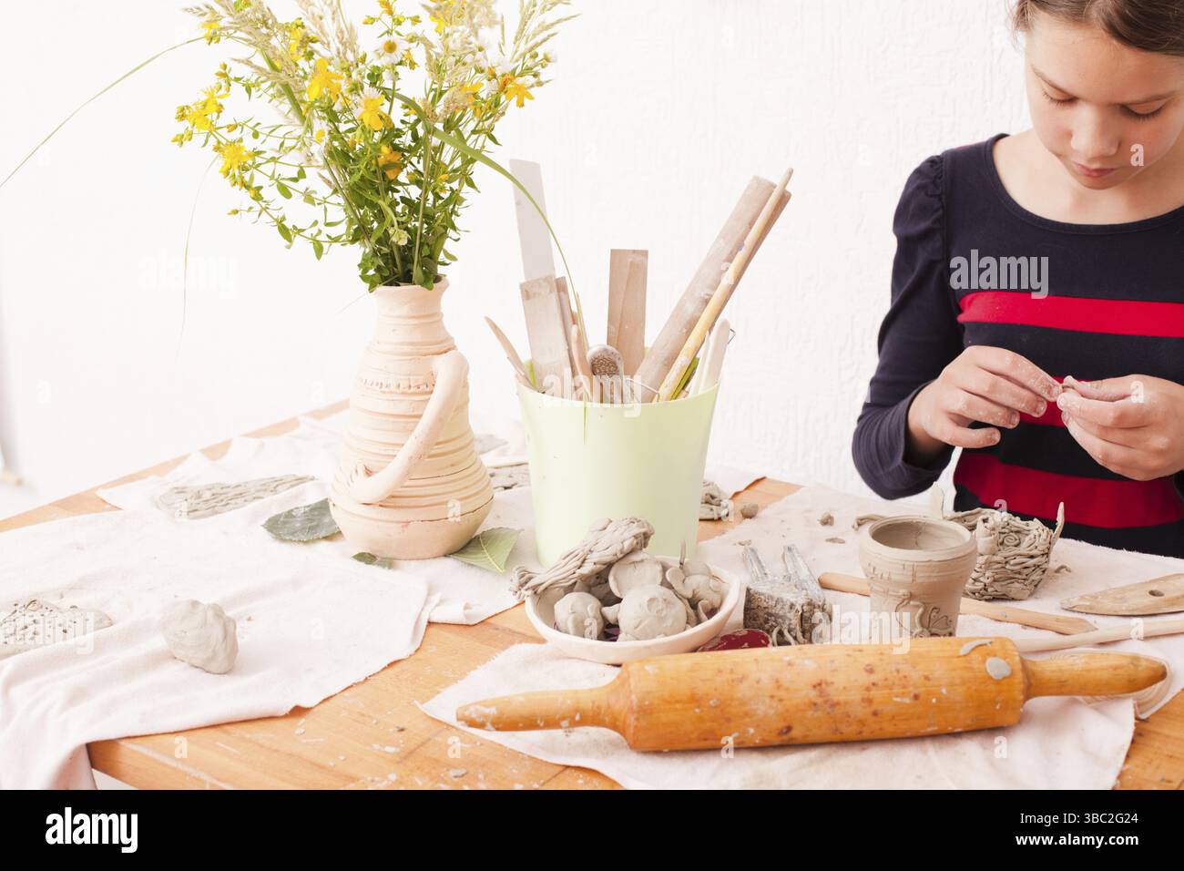 Process modeling figures from the modeling clay Stock Photo - Alamy