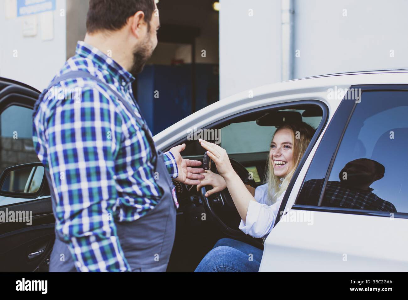 Regular customer arrived at a vehicle inspection to car service Stock ...
