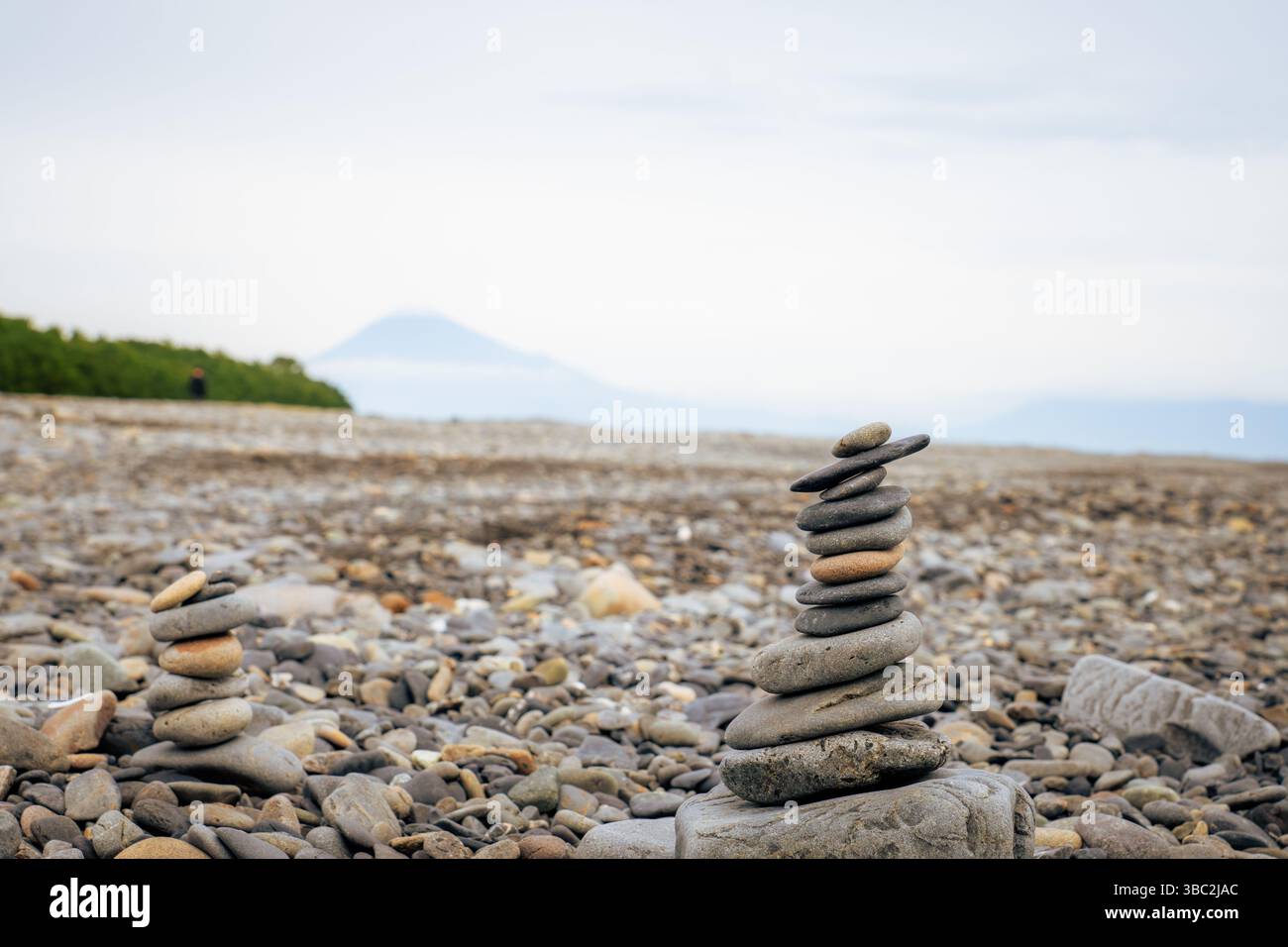 Rock stacking on Miho no Matsubara beach with mt Fuji Stock Photo - Alamy