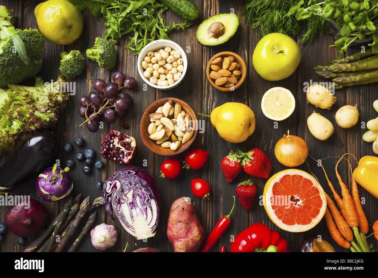 Trendy diet concept. Healthy foods on the wooden table top view. Fruits ...