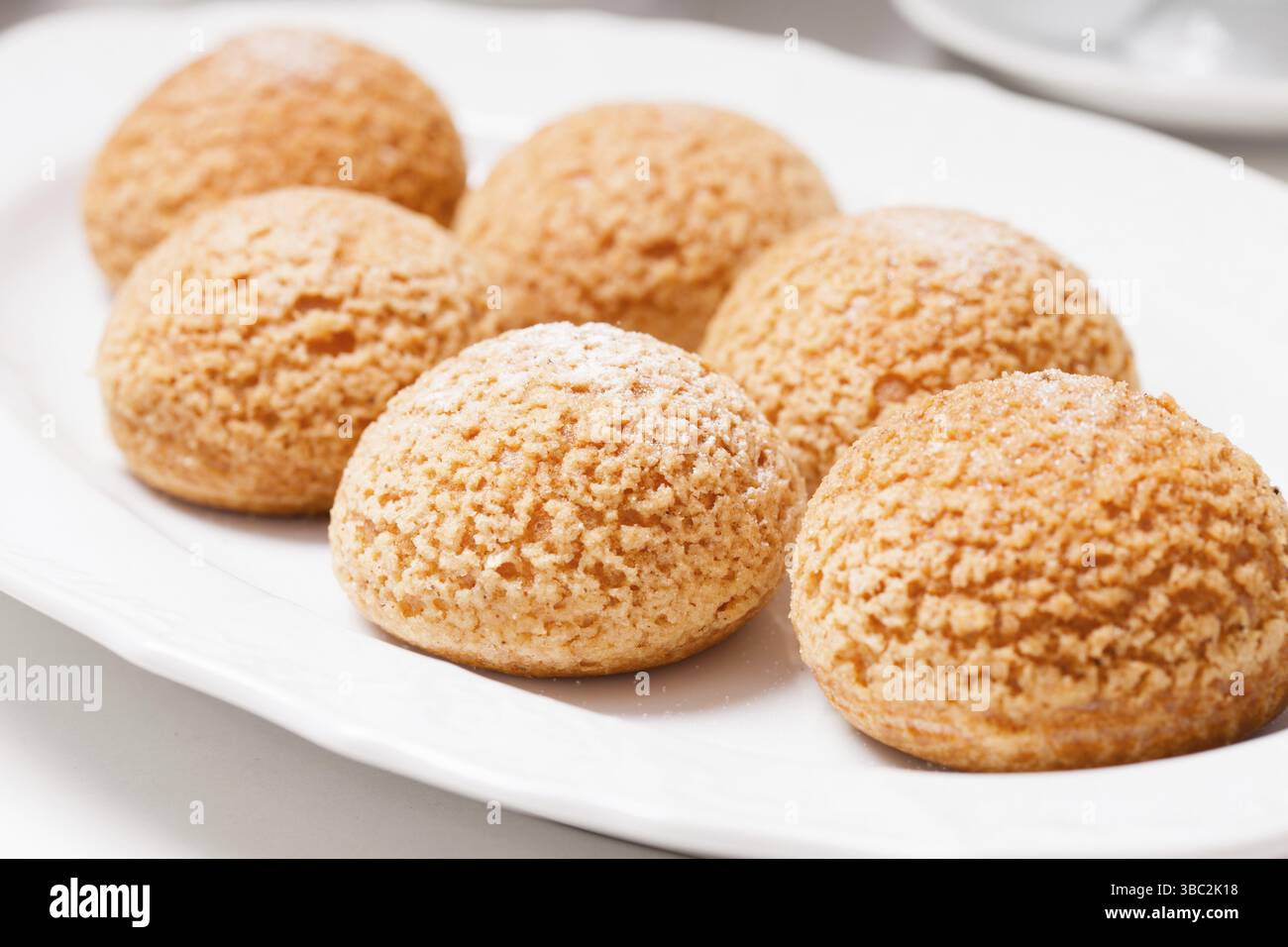 Choux - modern french dessert, puffs with craqueline and vanilla cream ...