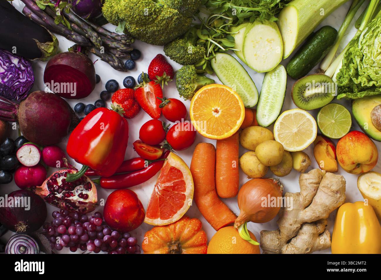 Rainbow colored fruits and vegetables top view. Juice and smoothie ...