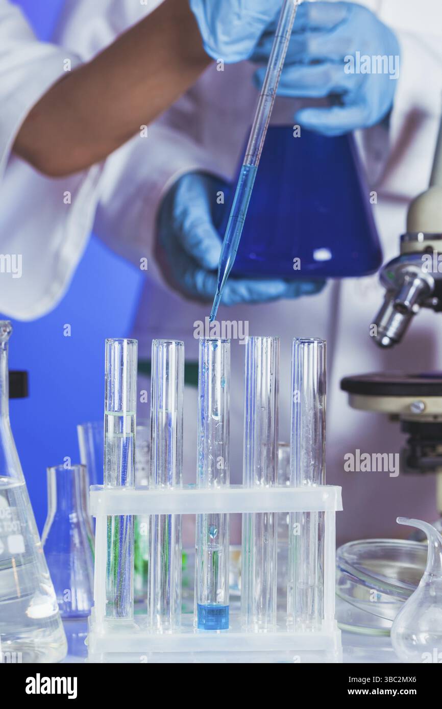 Two scientists in the chemical laboratory are doing experiments Stock ...