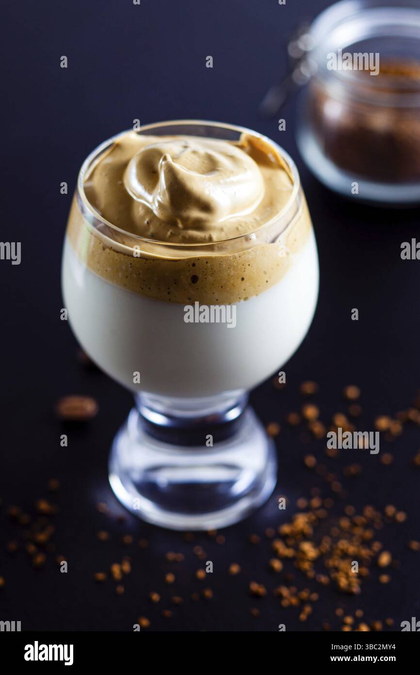 Dalgona coffee - whipped instant coffee mousse in the glass Stock Photo ...