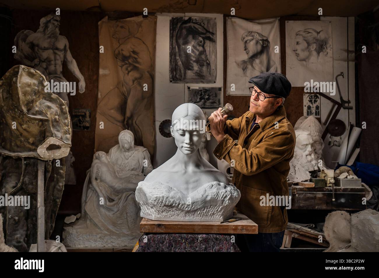 Award-winning figurative sculptor Andrian Melka works on a marble ...