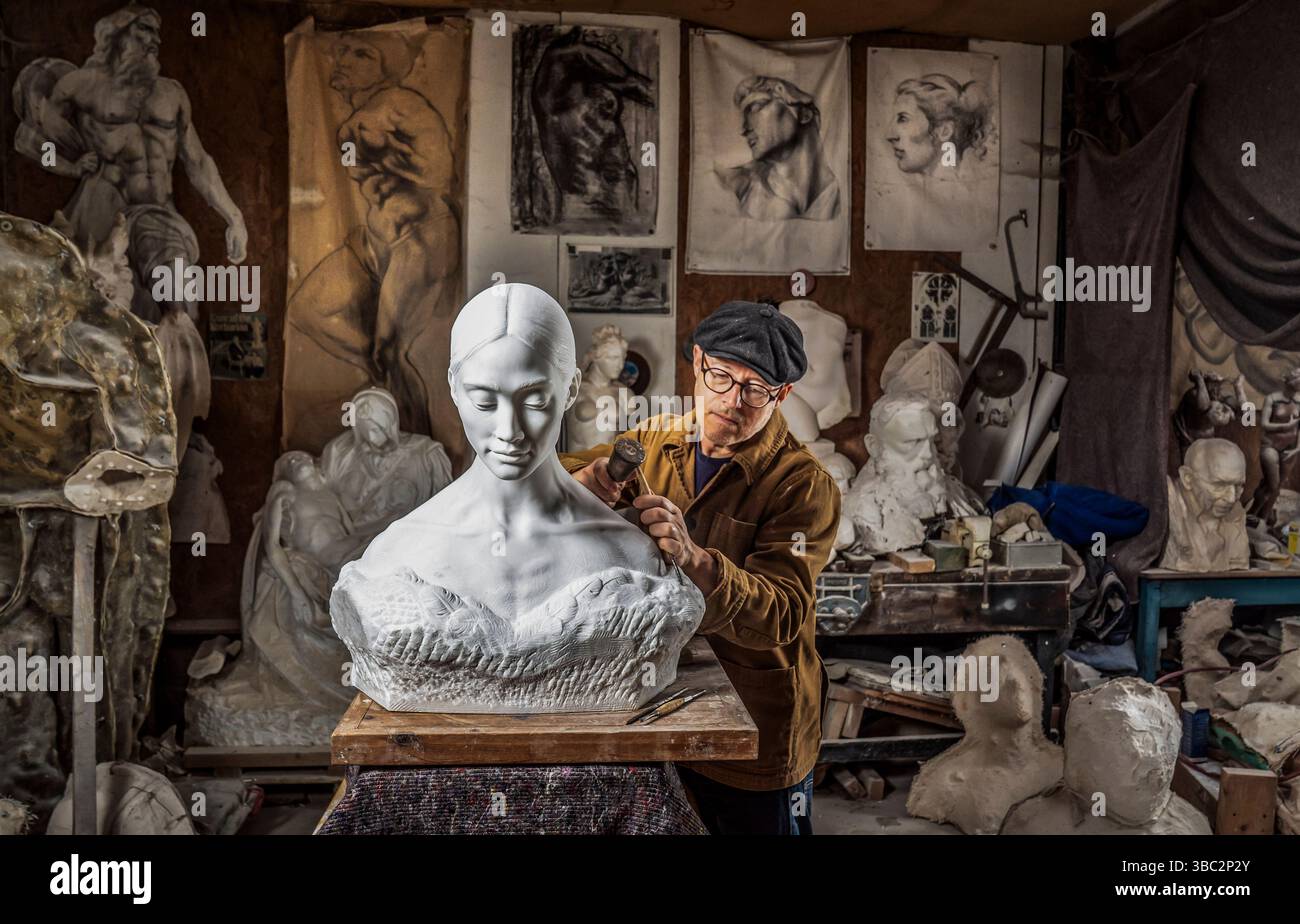 Award-winning figurative sculptor Andrian Melka works on a marble ...