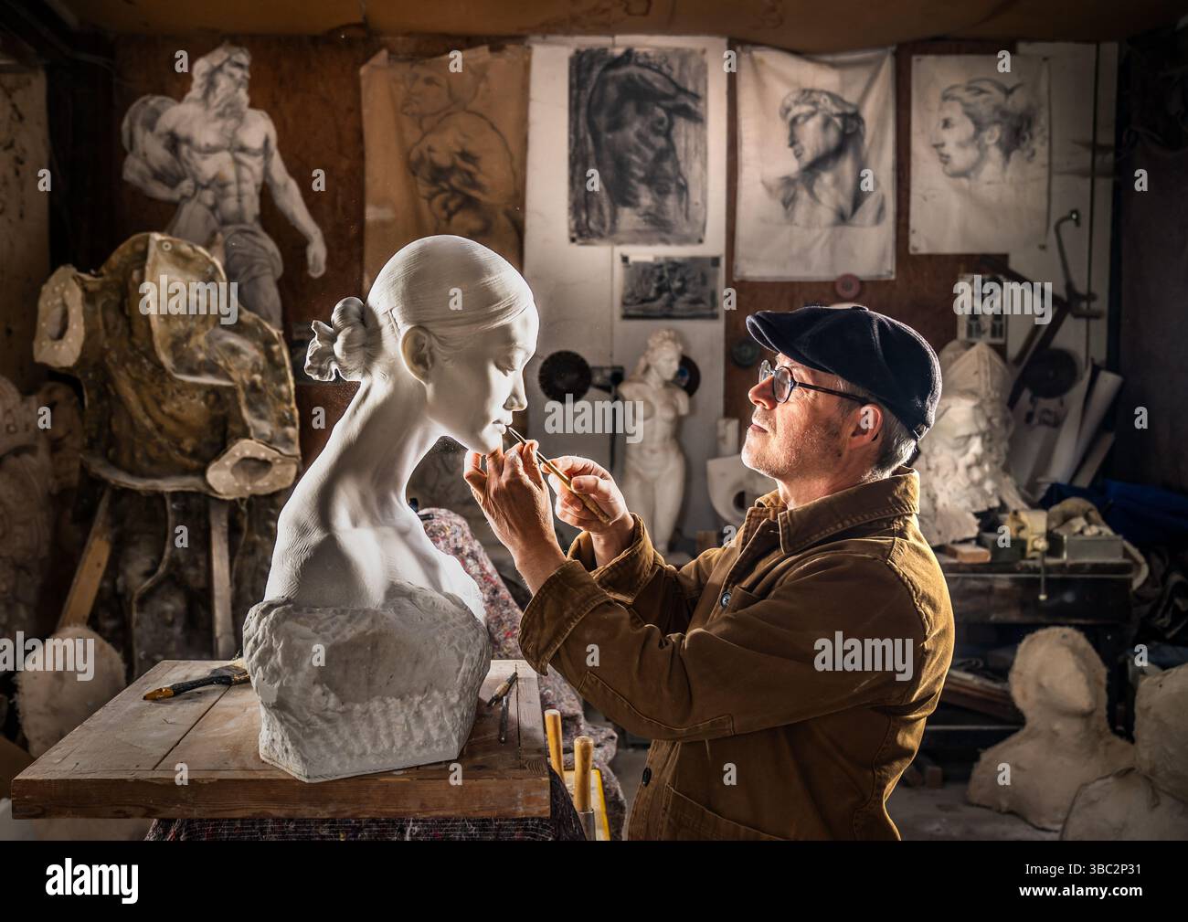 Award-winning figurative sculptor Andrian Melka works on a marble ...