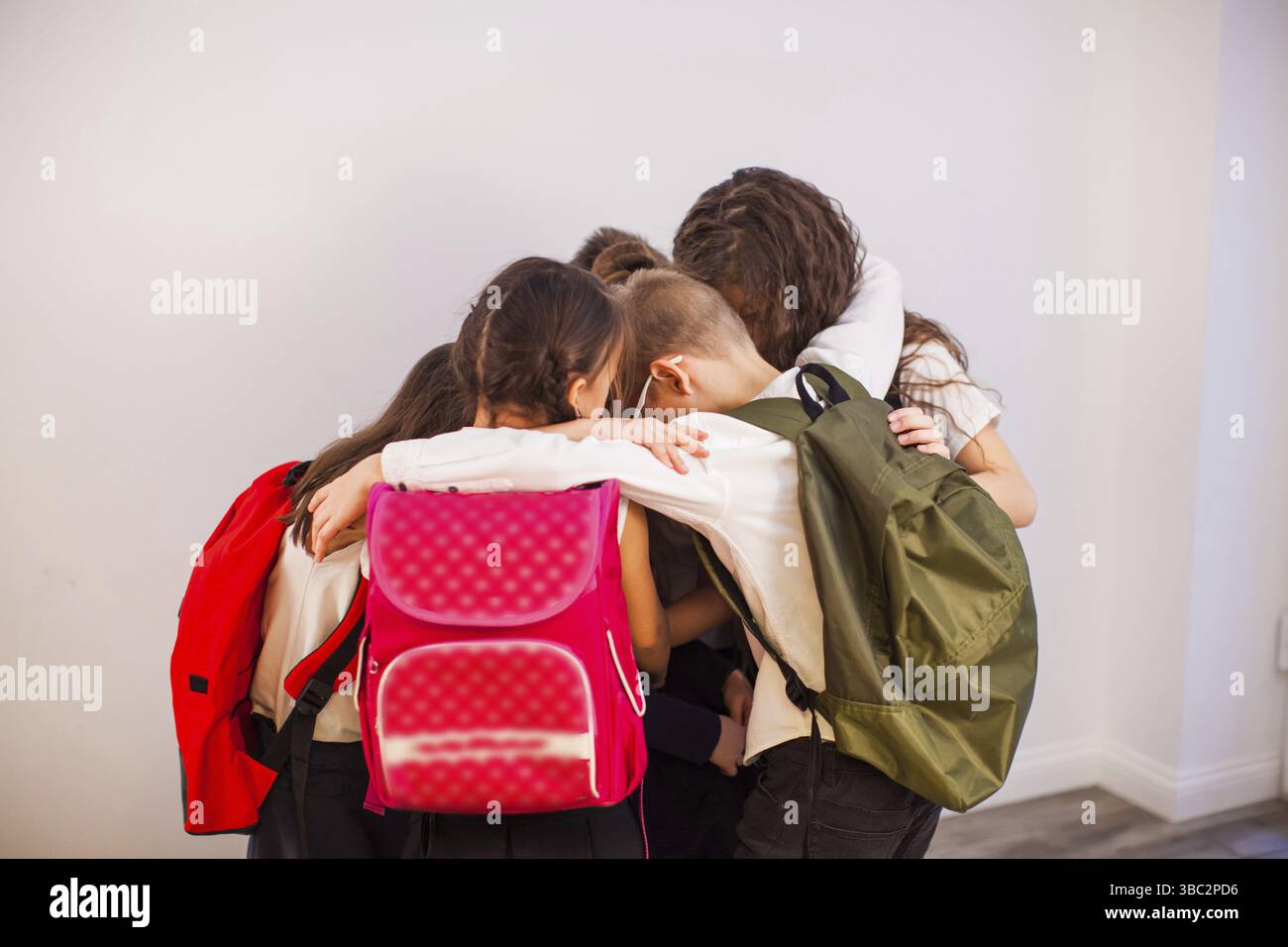 Happy school kids are ready for education. School children in uniform ...