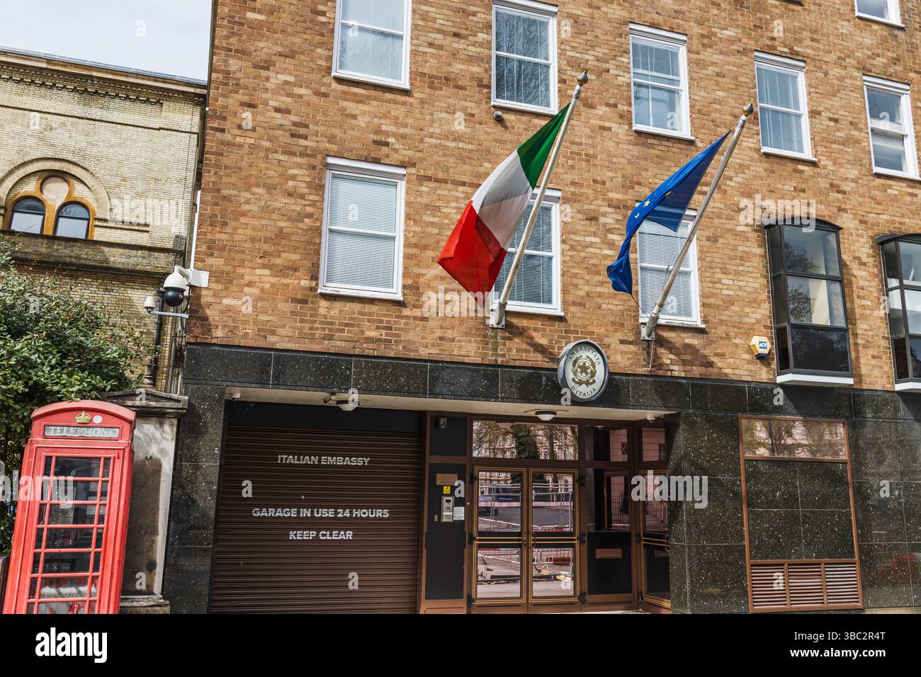 Italian Embassy with National Flags and Classic British Phone Booth ...