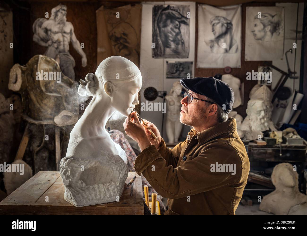 Award-winning figurative sculptor Andrian Melka works on a marble ...