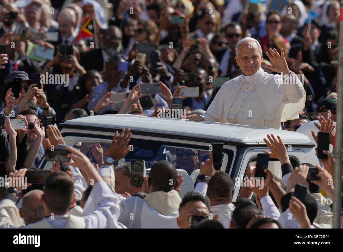 Pope Leo XIV's waves to people before his formal inauguration of his ...
