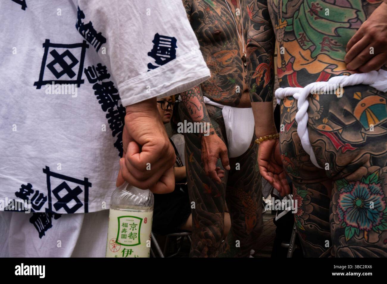 Heavily tattooed persons wearing fundoshi, or loincloth, pose for ...