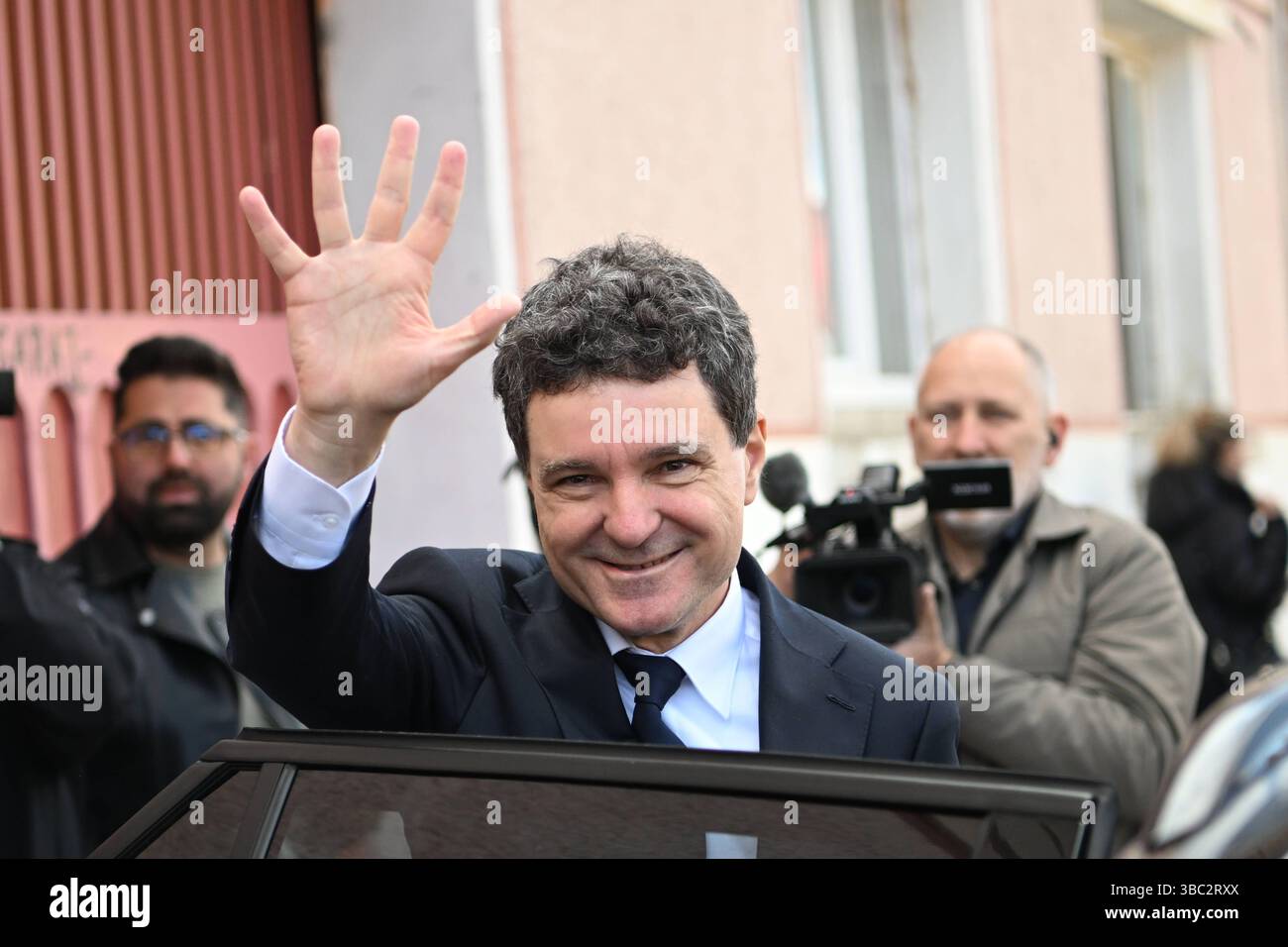 Romania Election Presidential candidate Nicusor Dan casts his vote with ...
