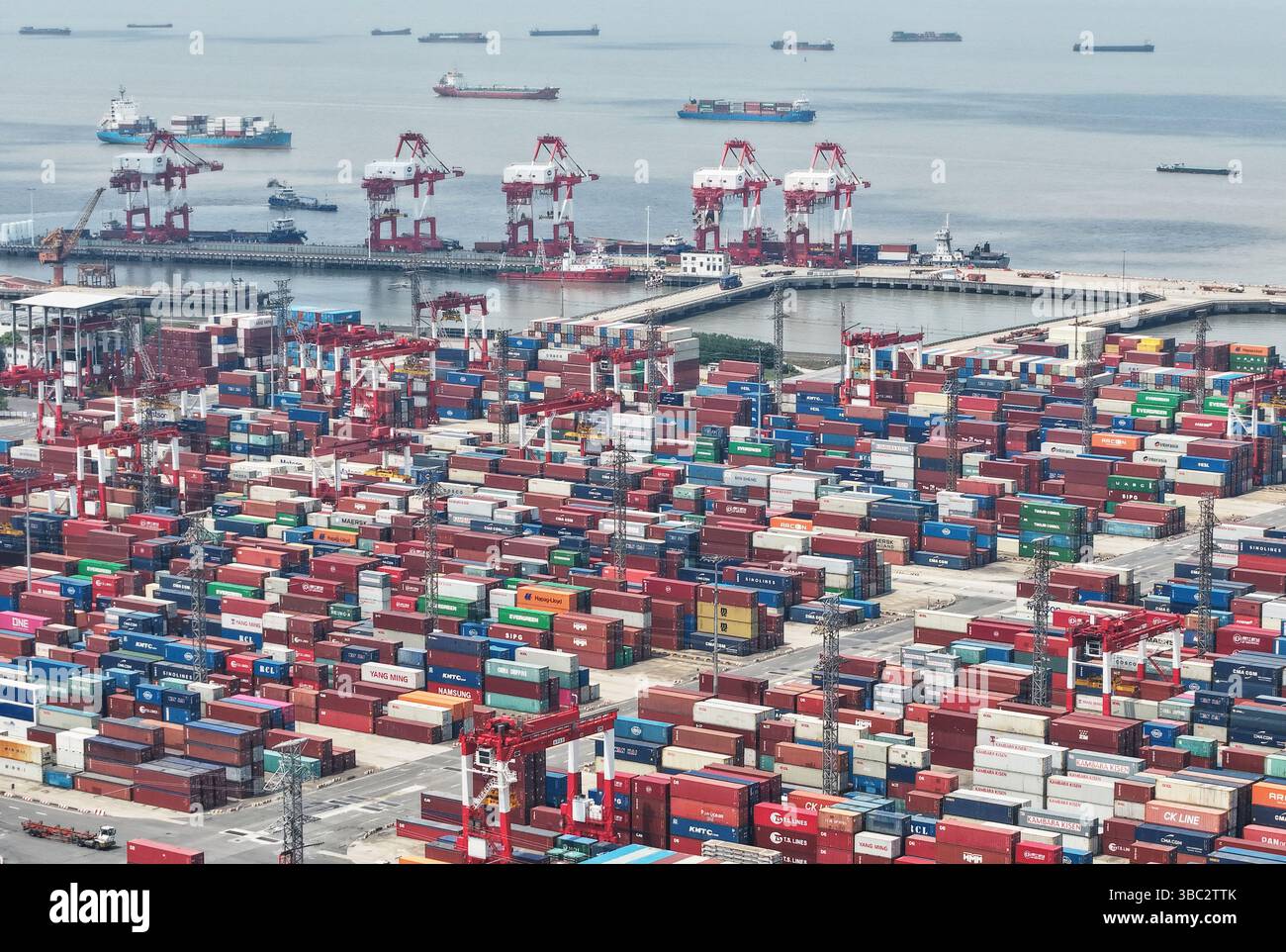 SHANGHAI, CHINA - MAY 18, 2025 - A pile of foreign trade containers at ...