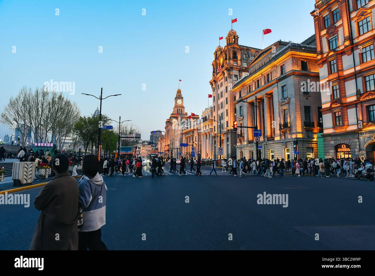 Shanghai, China - 1 April 2025: Tourists stroll along Nanjing Road at ...