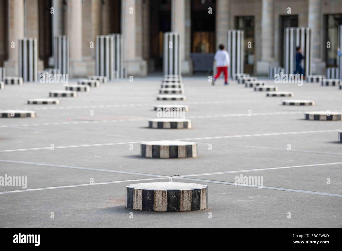 Les Deux Plateaux, also known as Colonnes de Buren, an art installation ...