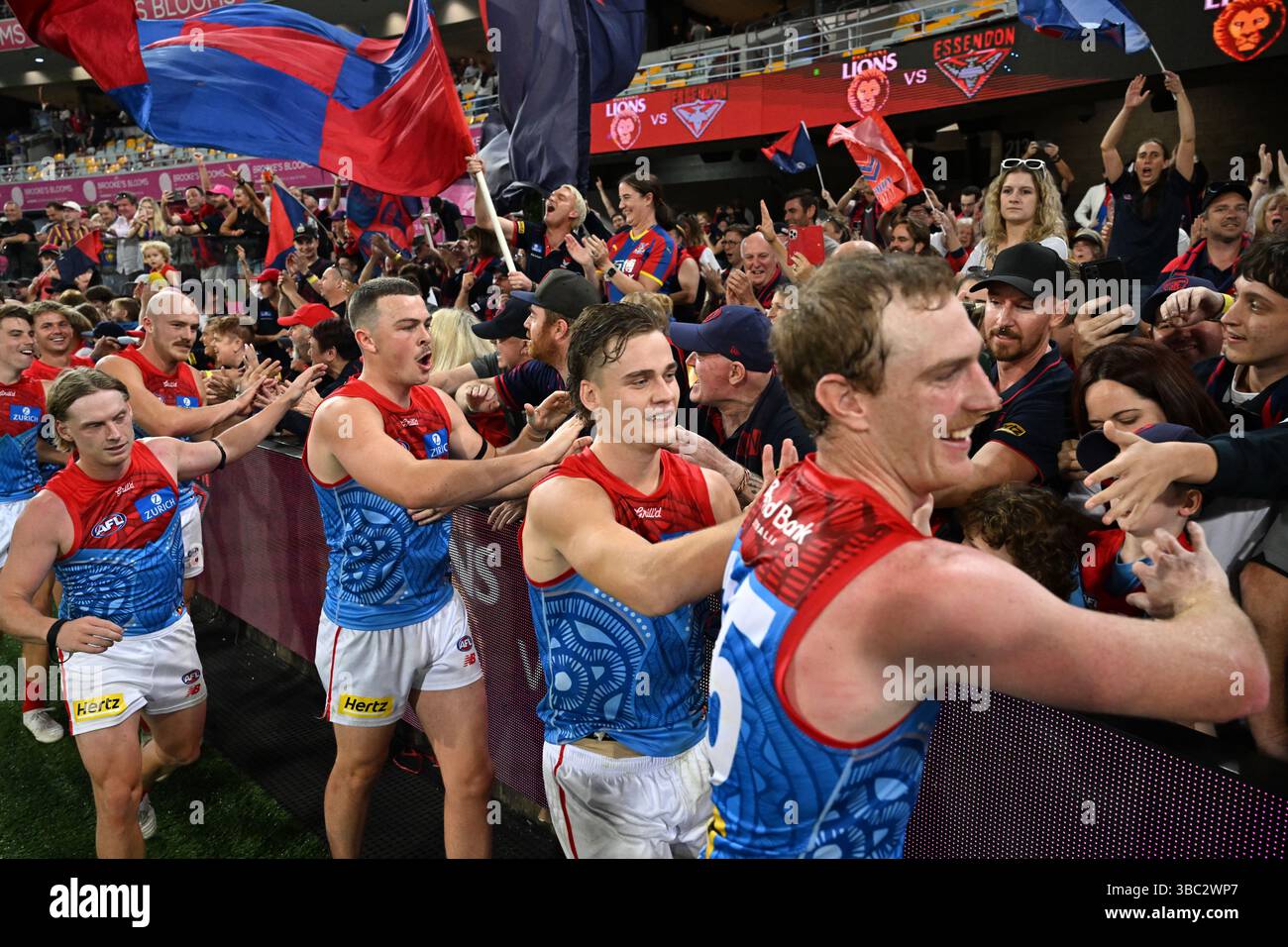 Brisbane, Australia. 18th May, 2025. Demons players celebrate winning ...