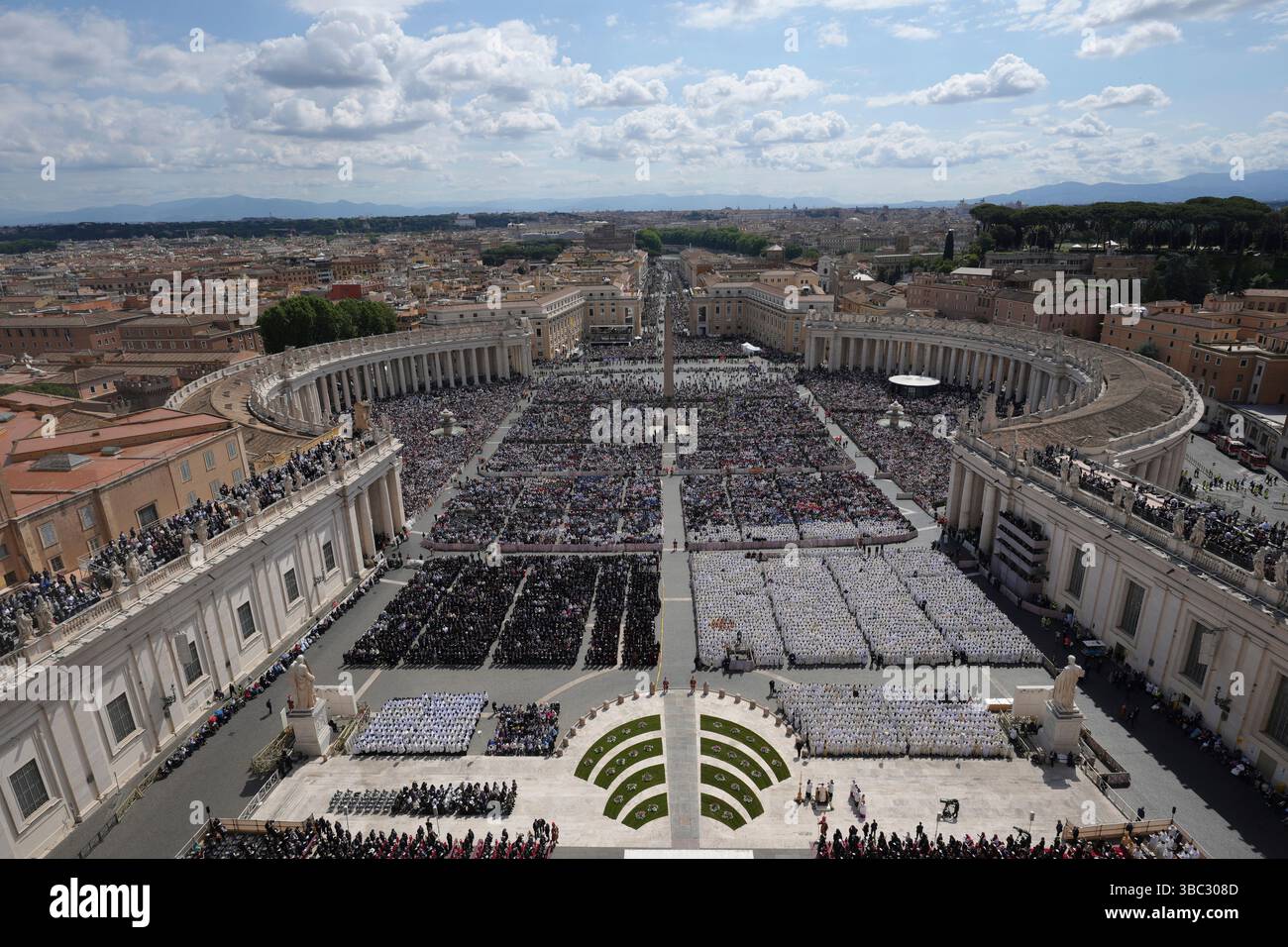 People gather as Pope Leo XIV celebrates a Mass for the formal ...
