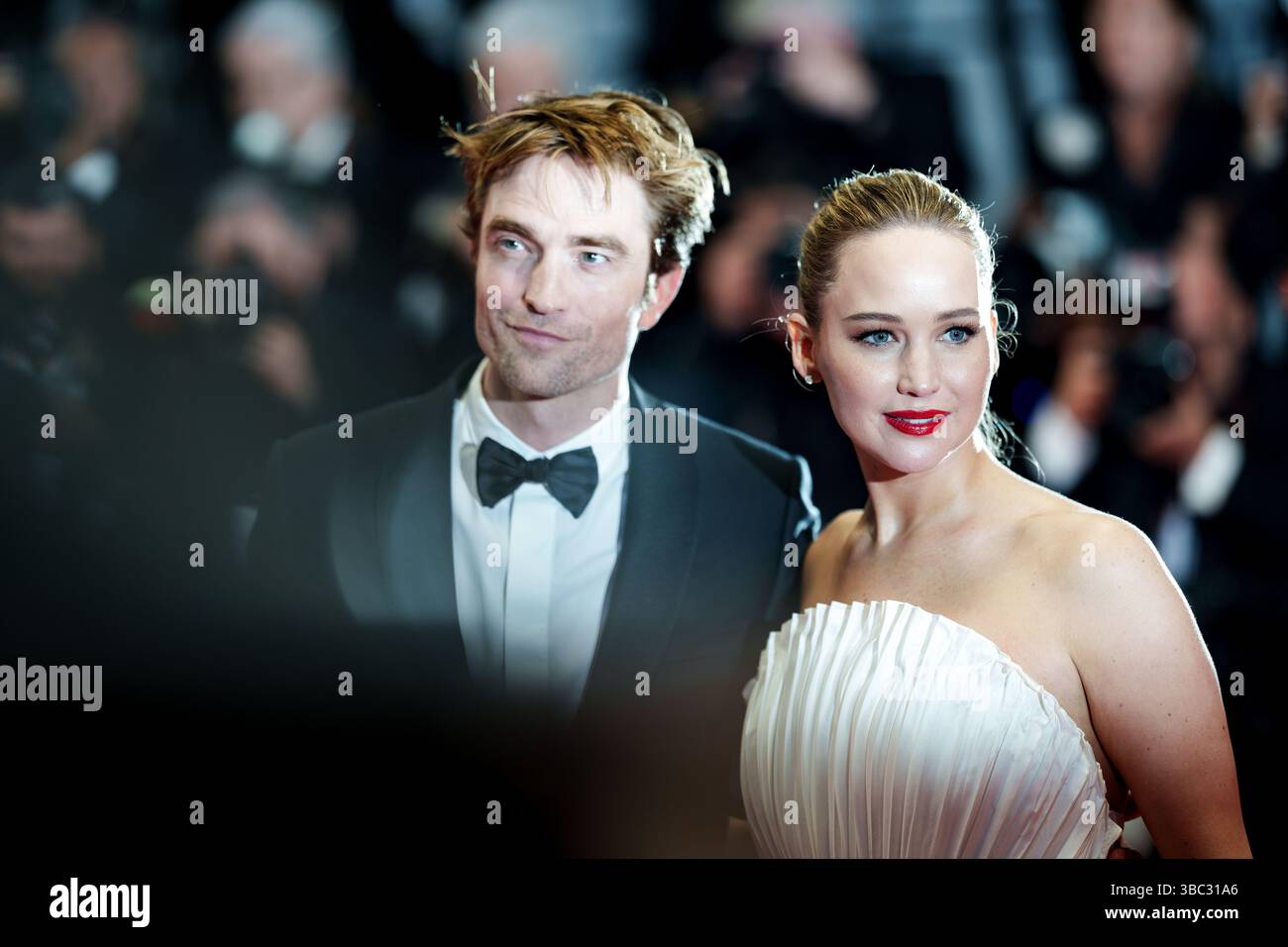 CANNES, FRANCE - MAY 17: Jennifer Lawrence and Robert Pattinson attend ...